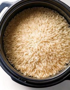 Put uncooked rice in a slow cooker with these 4 ingredients. It’s like ...